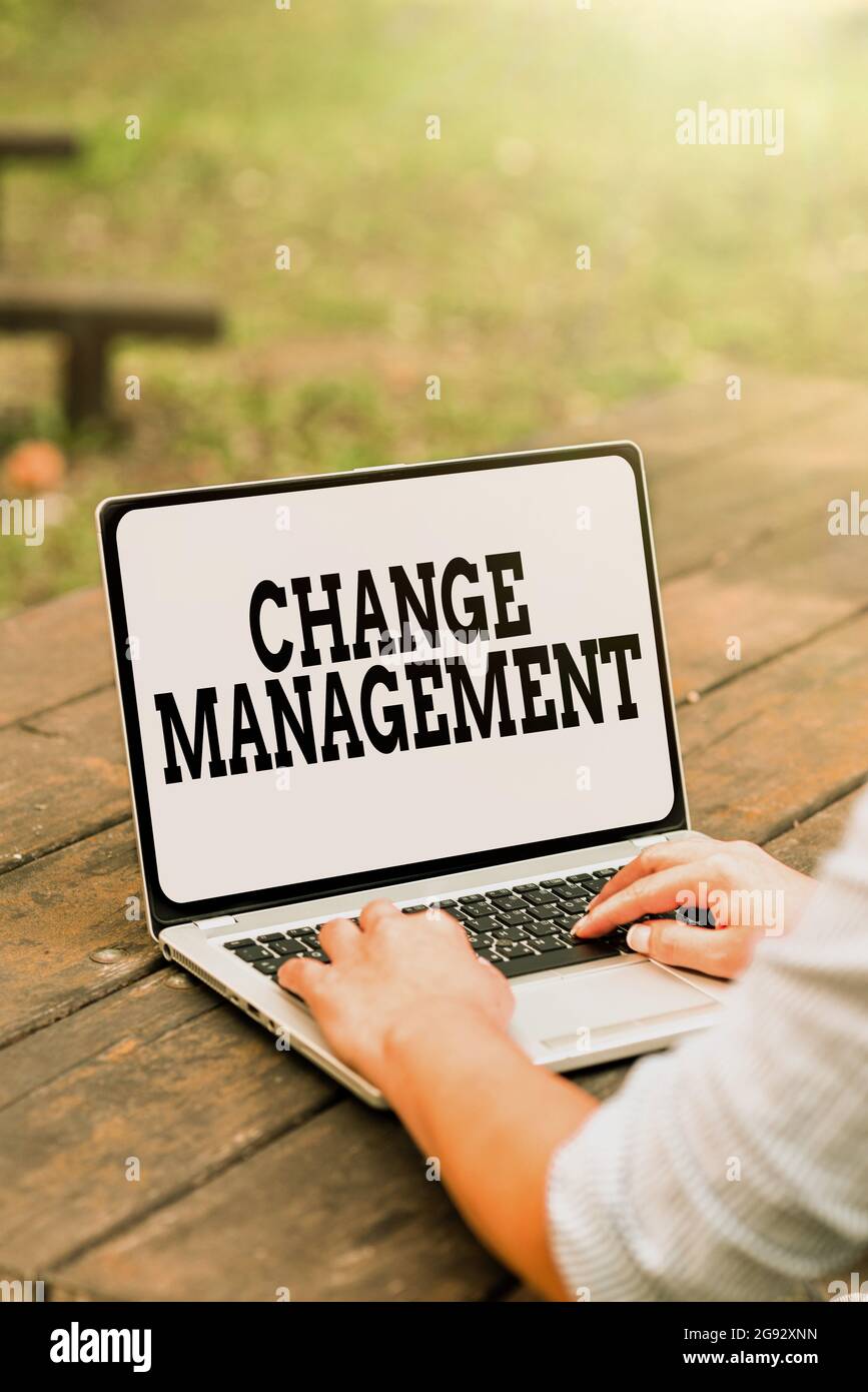 Writing displaying text Change Management. Word Written on systematic approach to dealing with ...