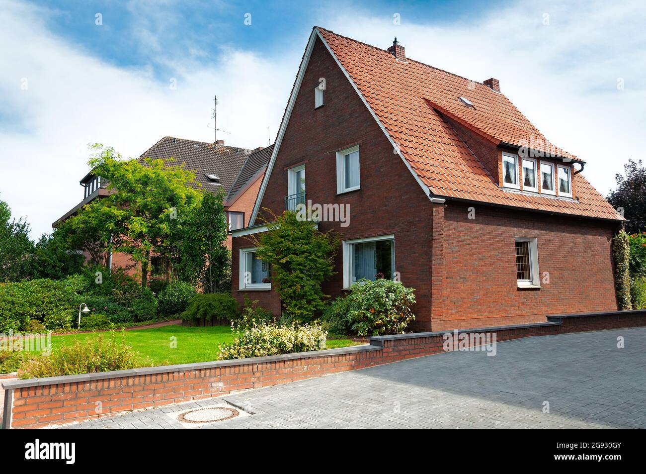 Cozy german red house. Home exterior Stock Photo - Alamy