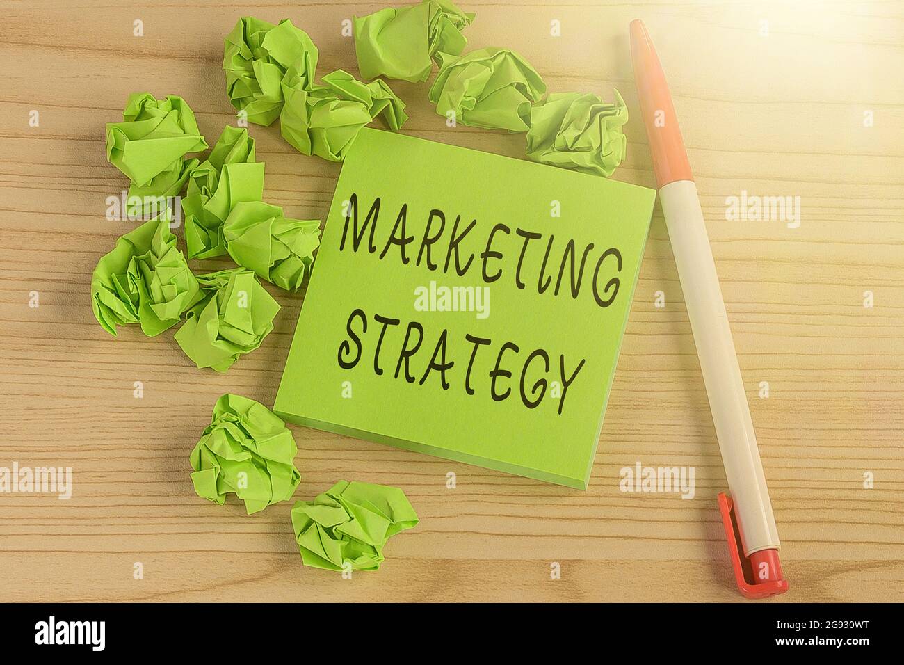 Hand writing sign Marketing Strategy. Business approach plan of action ...