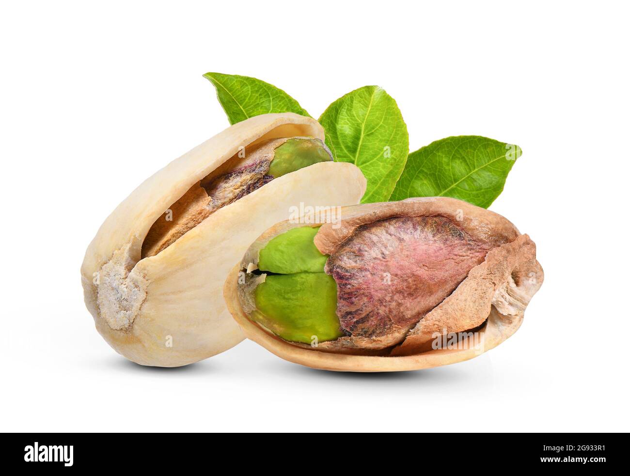 Pistachios with leaf isolated on white background Stock Photo - Alamy