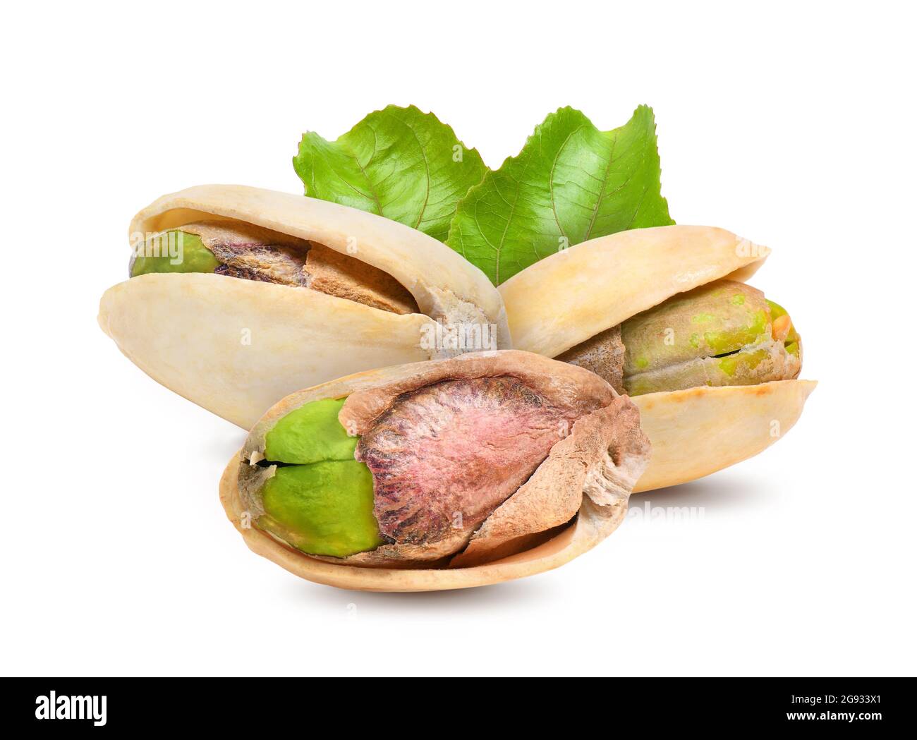 Pistachios with leaf isolated on white background Stock Photo - Alamy
