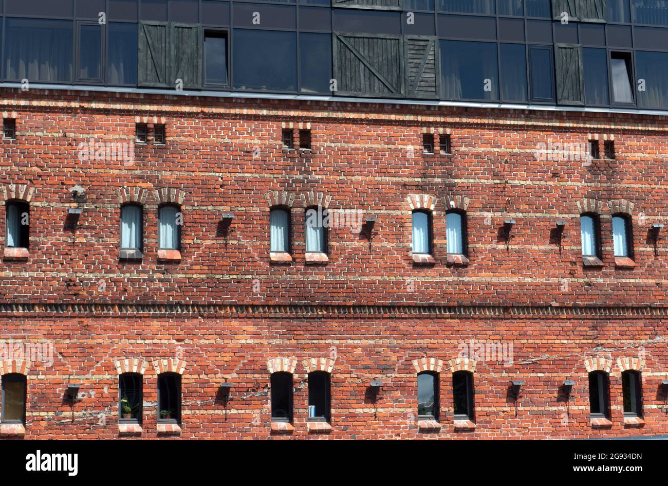 Facade of a historic port warehouse Stock Photo - Alamy