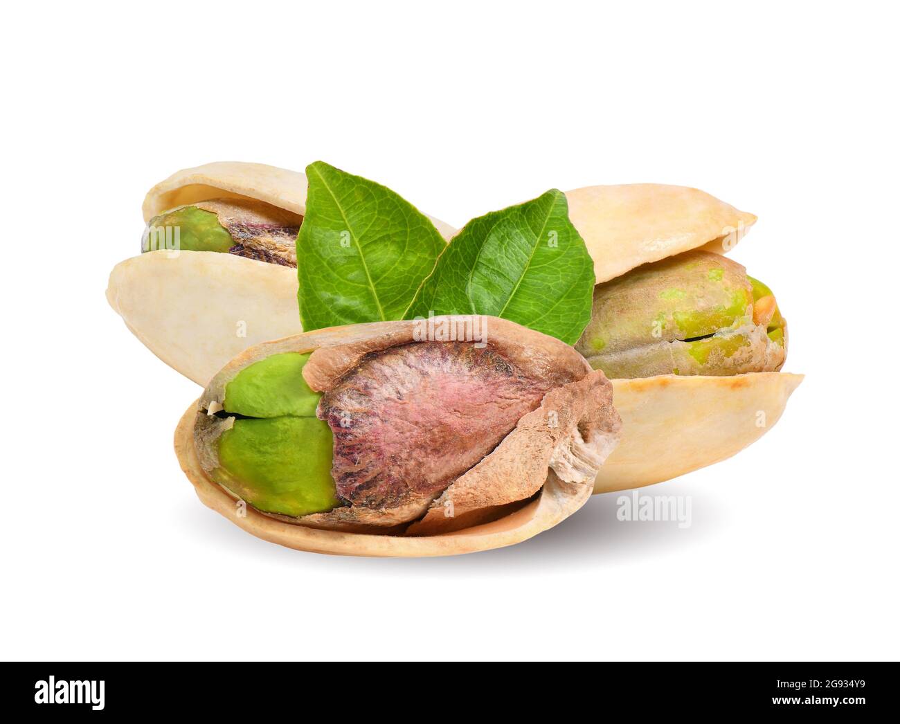 Pistachios with leaf isolated on white background Stock Photo - Alamy