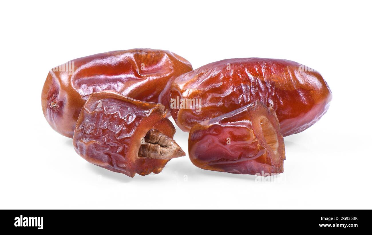 dried date on white background Stock Photo - Alamy