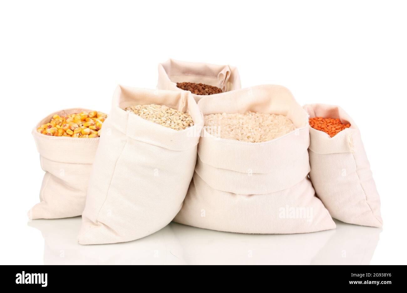 Cloth bags with grain isolated on white Stock Photo - Alamy