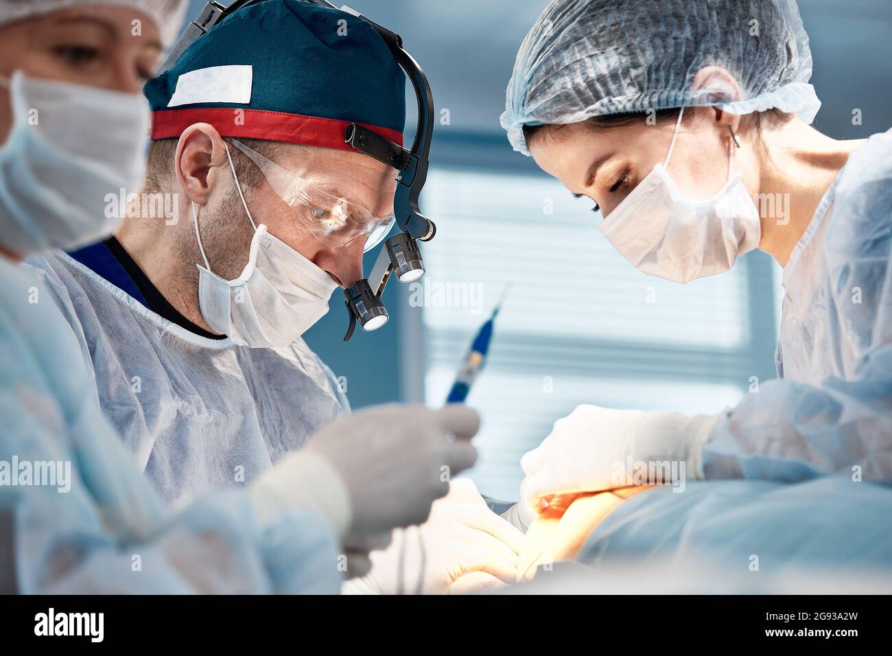 Female anesthesiologist in operating room hi-res stock photography and ...