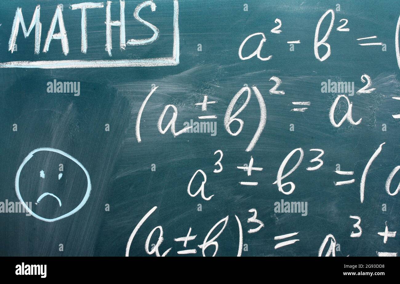 Math formulas written on the desk Stock Photo - Alamy