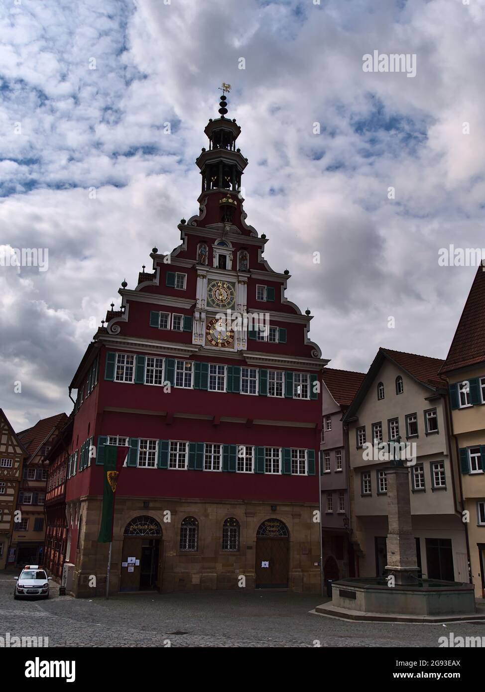 Old city hall of Esslingen with red colored facade located on square ...