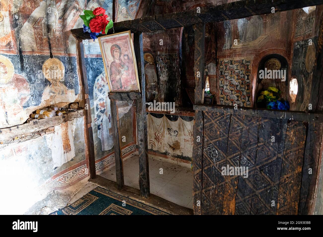 Icons, frescoes on the walls inside the amazing orthodox cave church ...