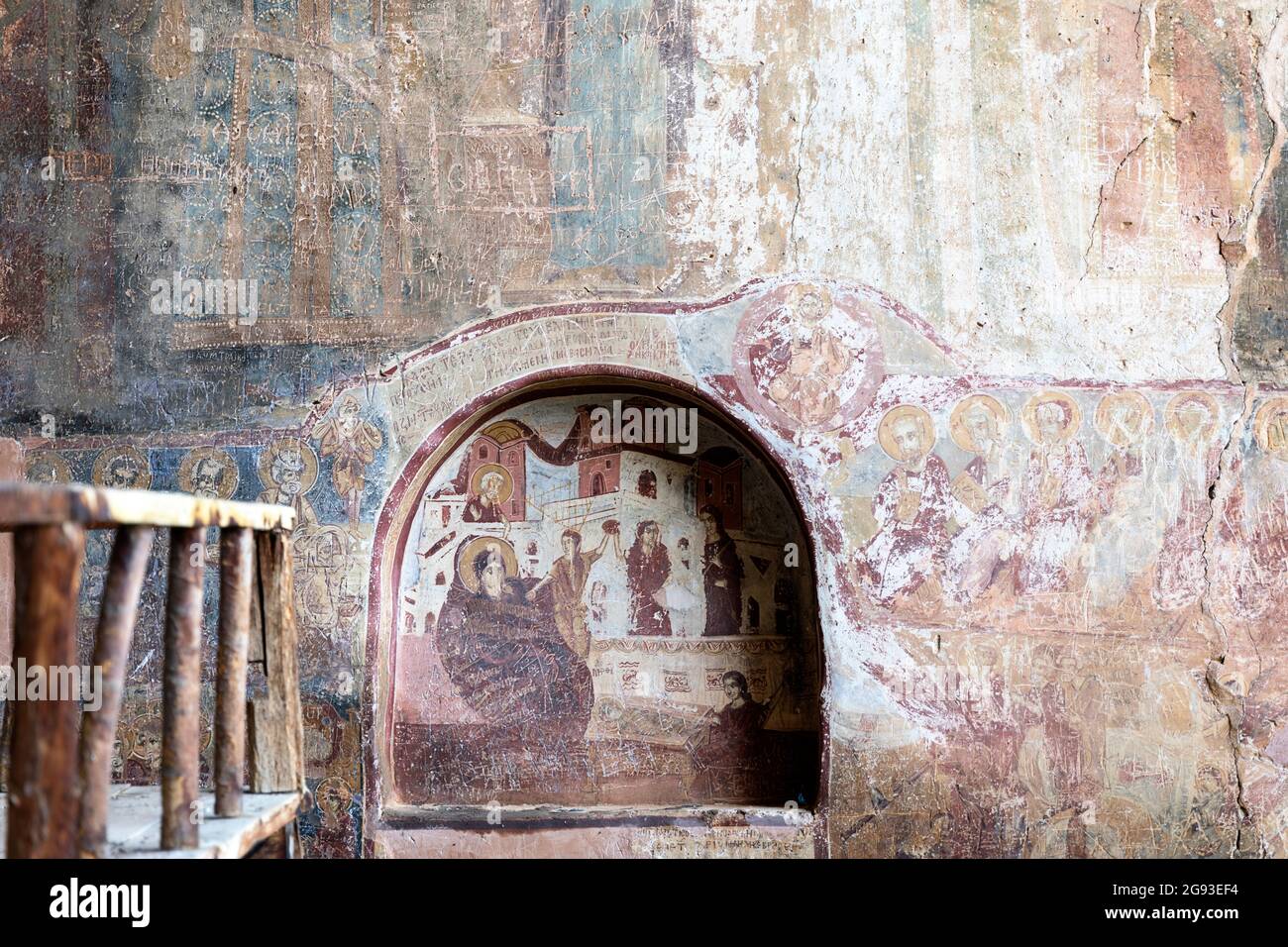 Icons, frescoes on the walls inside the amazing orthodox cave church ...