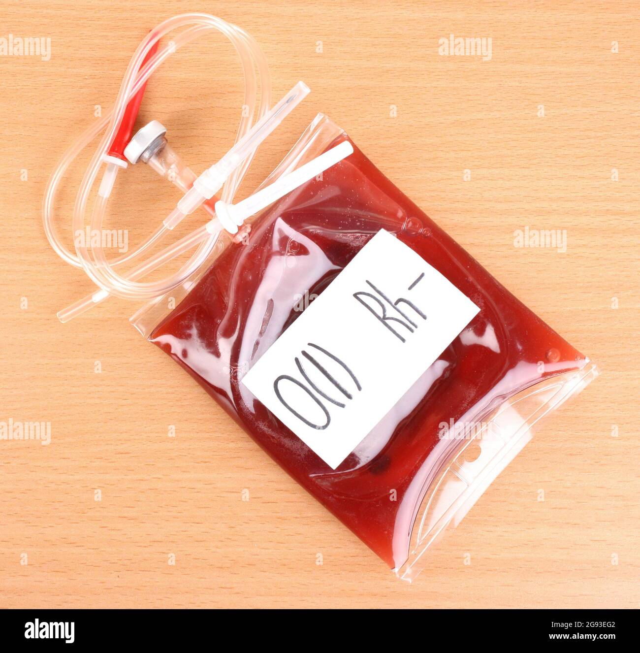Bag of blood and infusion on wooden background Stock Photo - Alamy