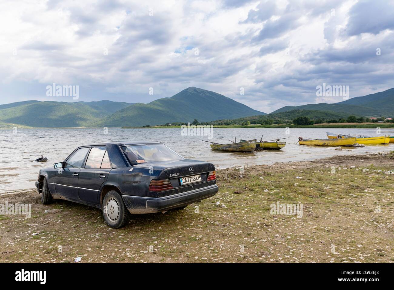 Old Mercedes car parked on a shore of Prespa lake close to local ...