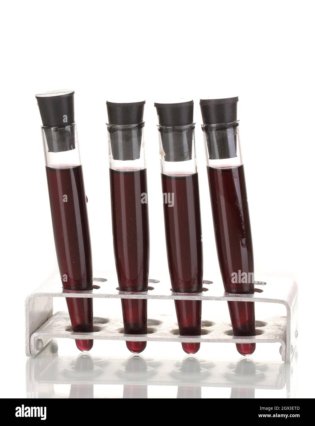 Test-tubes with brown liquid isolated on white Stock Photo - Alamy