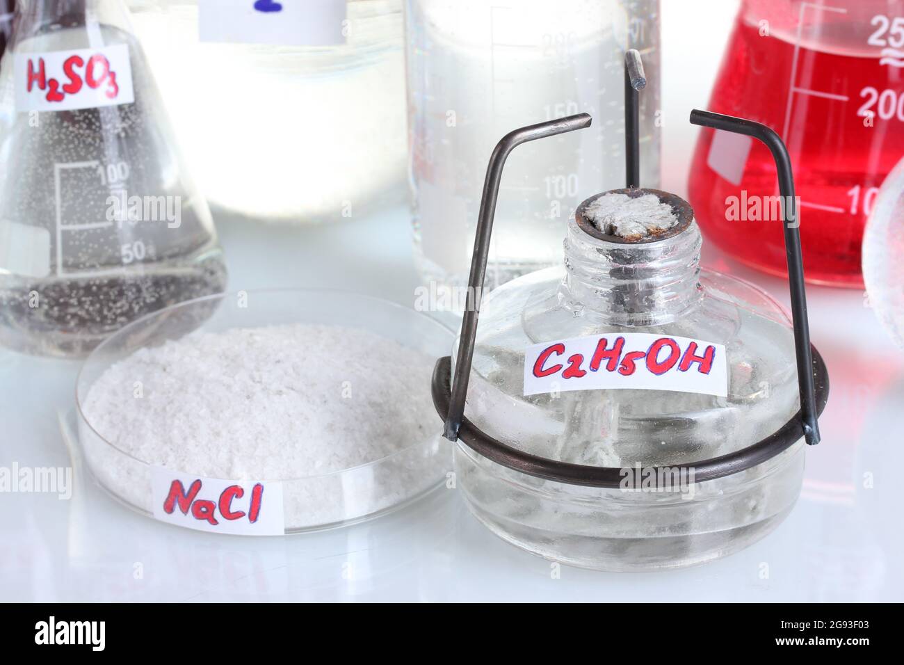 Test-tubes with various acids and chemicals close-up Stock Photo - Alamy