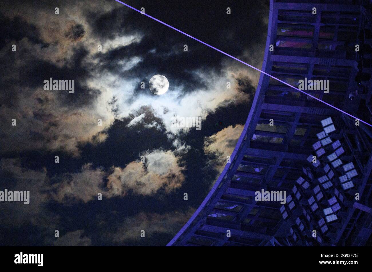 The full moon behind clouds over the Olympic Stadium, feature, symbol ...
