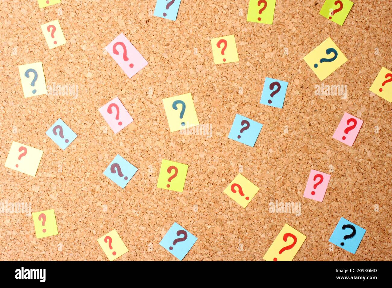 Many question marks on cork board Stock Photo - Alamy