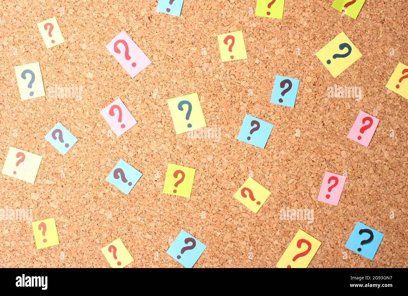 Many question marks on cork board Stock Photo - Alamy
