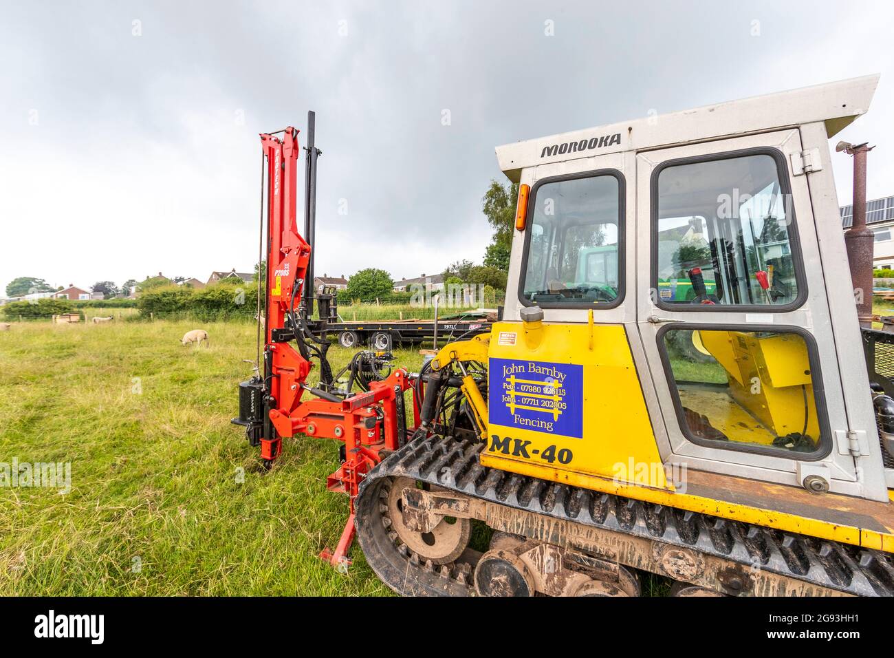 Tracked mechanical post driver and fencing machine. Driven either from ...