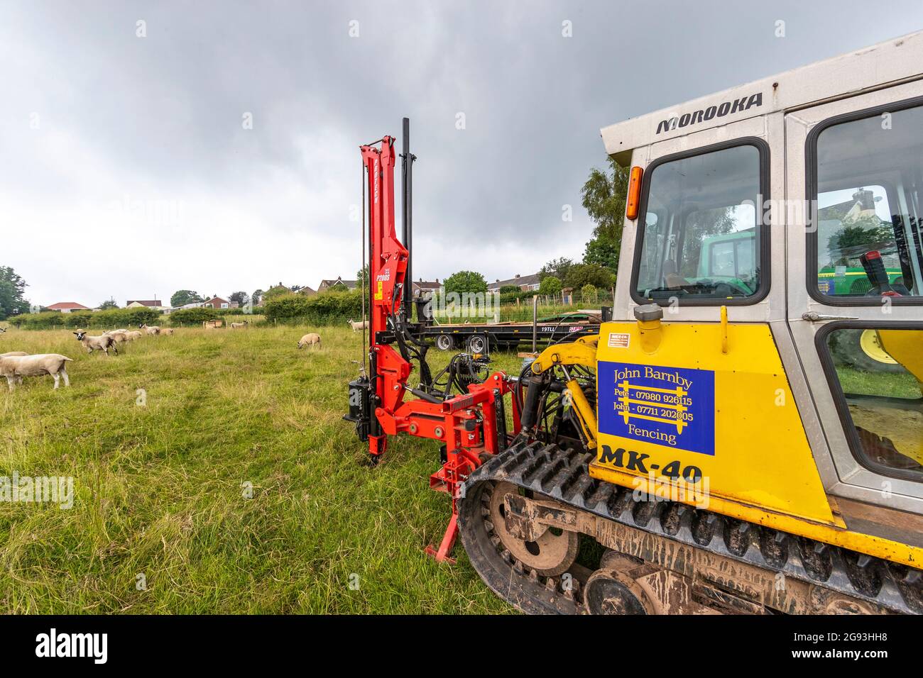 Tracked mechanical post driver and fencing machine. Driven either from ...