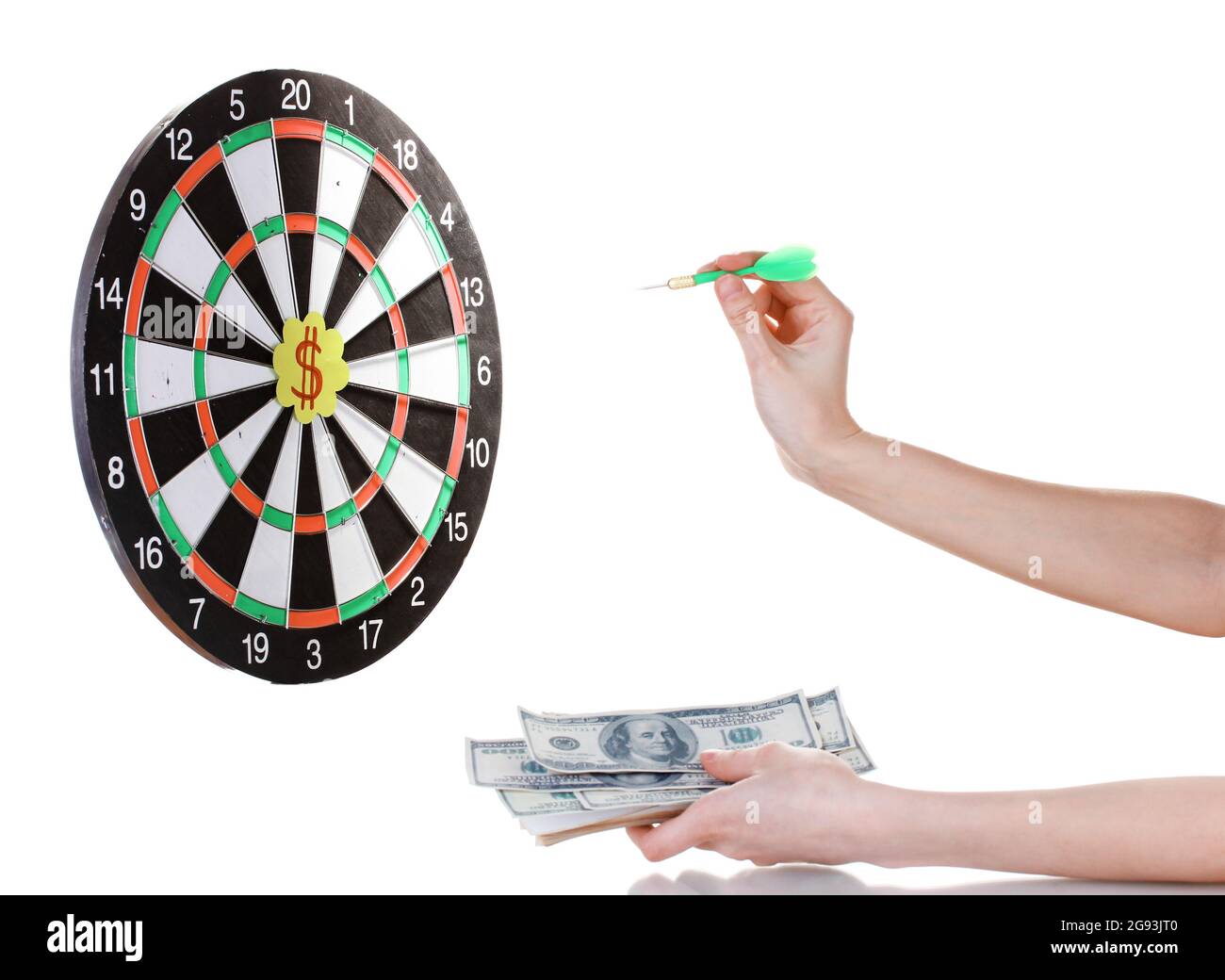 A hand throwing a dart at a sticker on darts on white background Stock ...