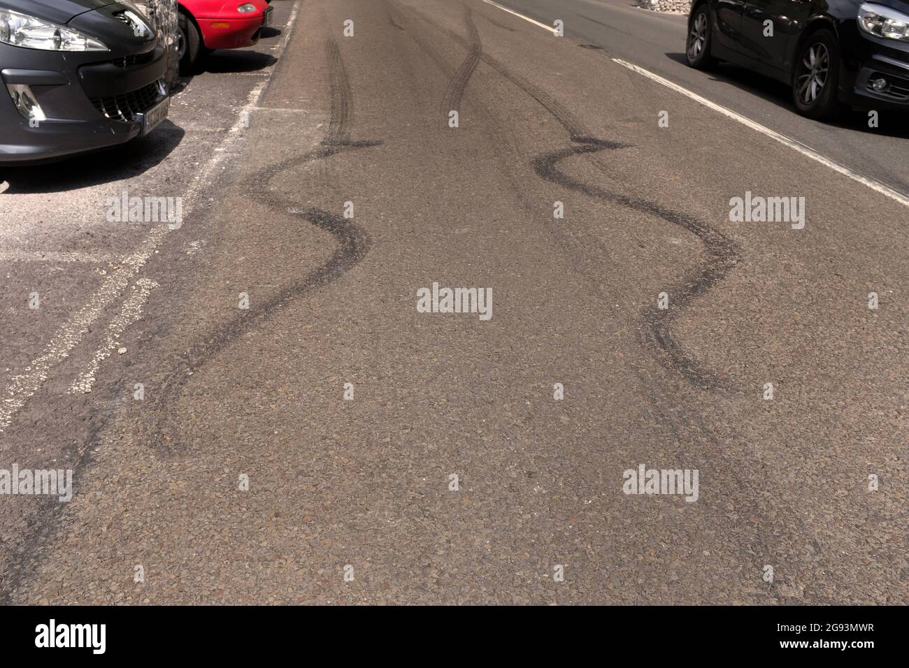 May 2021 - Car tyre skid marks on the road surface of Cheddar Gorge ...