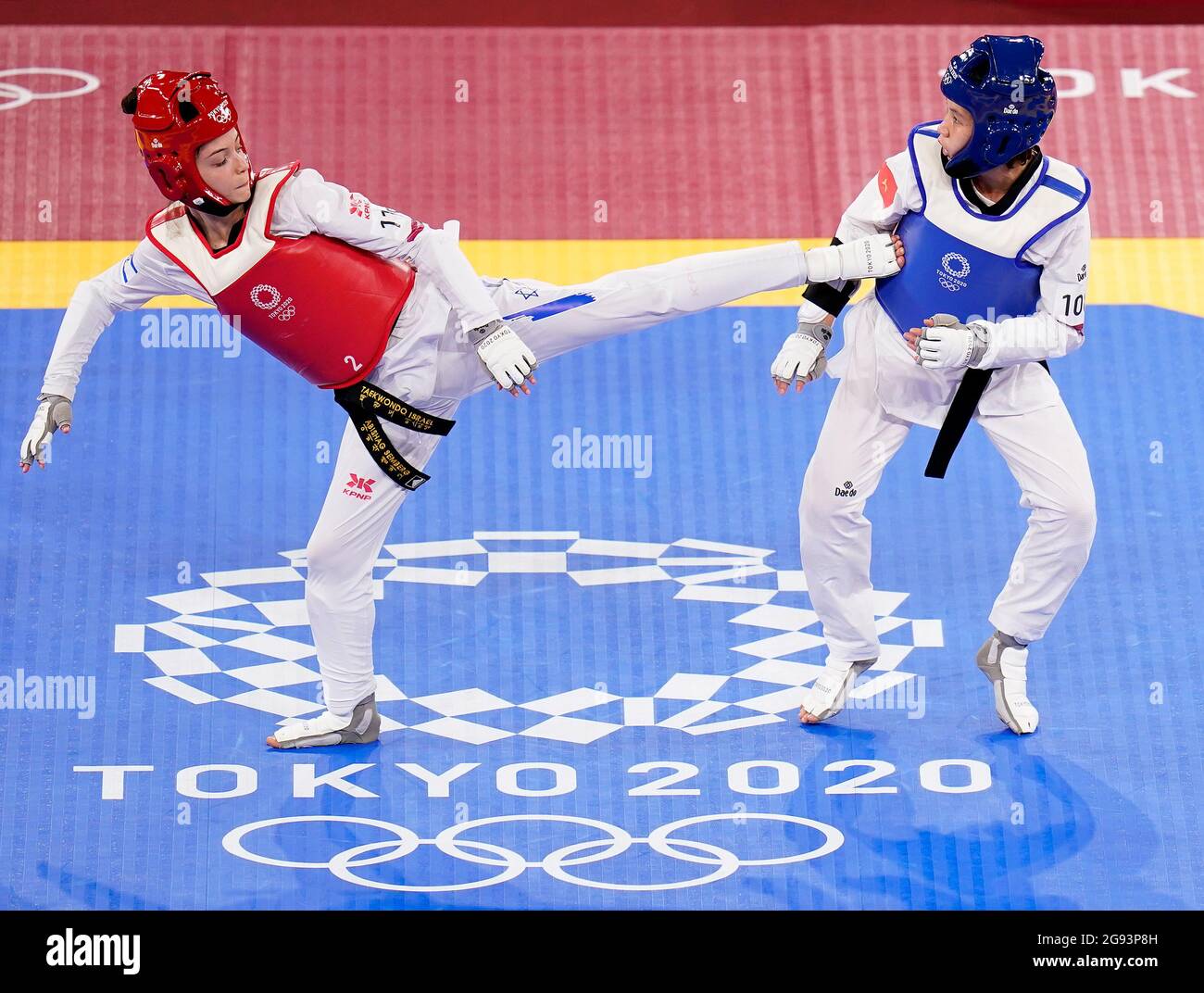 Vietnam's Truong Thi Kim Tuyen (blue) competes against Israel's Avishag ...