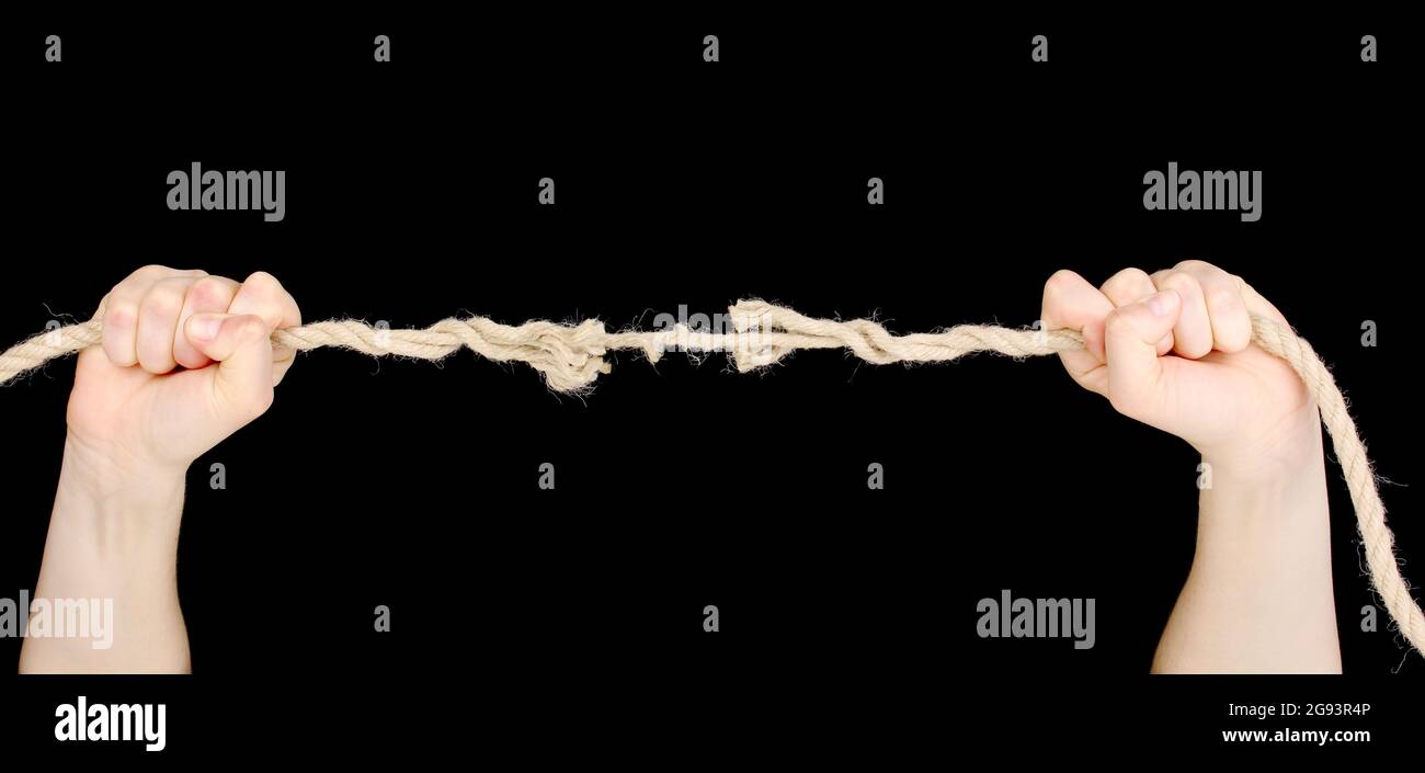Hands breaking rope hi-res stock photography and images - Alamy