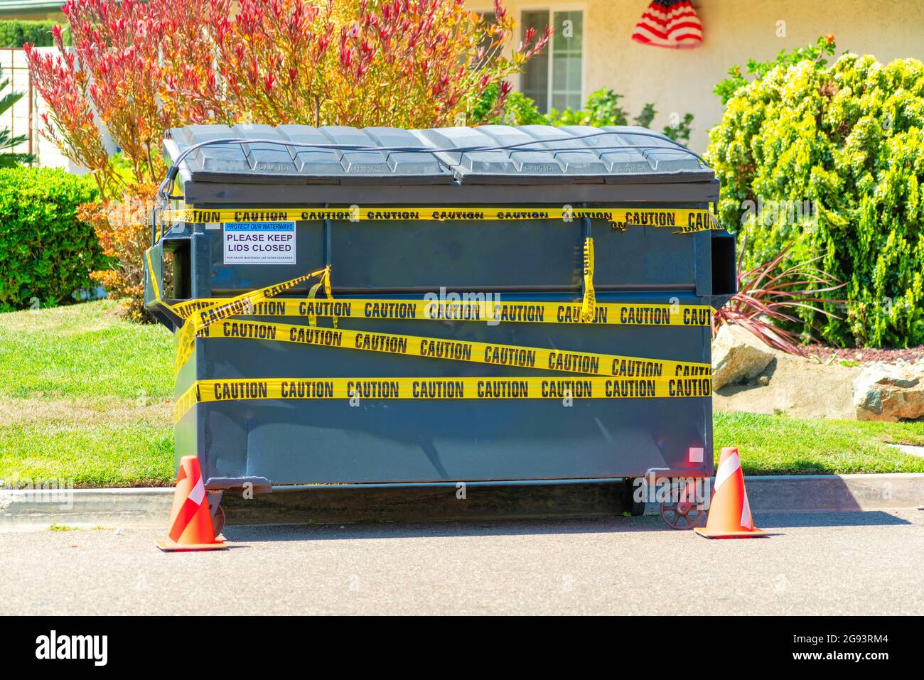 Dumpster on the street Stock Photo - Alamy