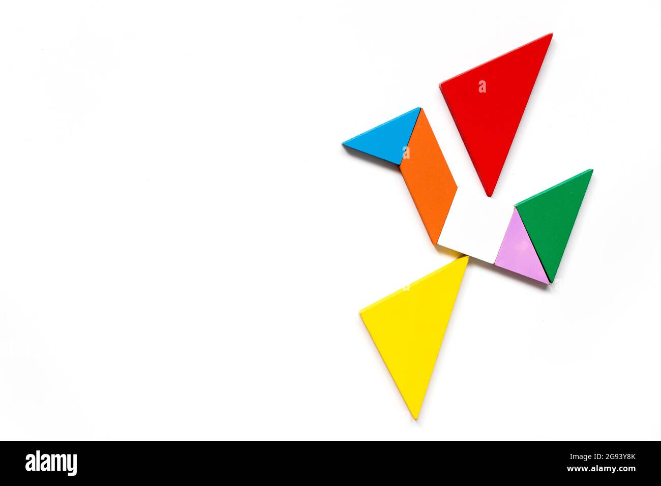 Color wood tangram puzzle in flying bird shape on white background ...