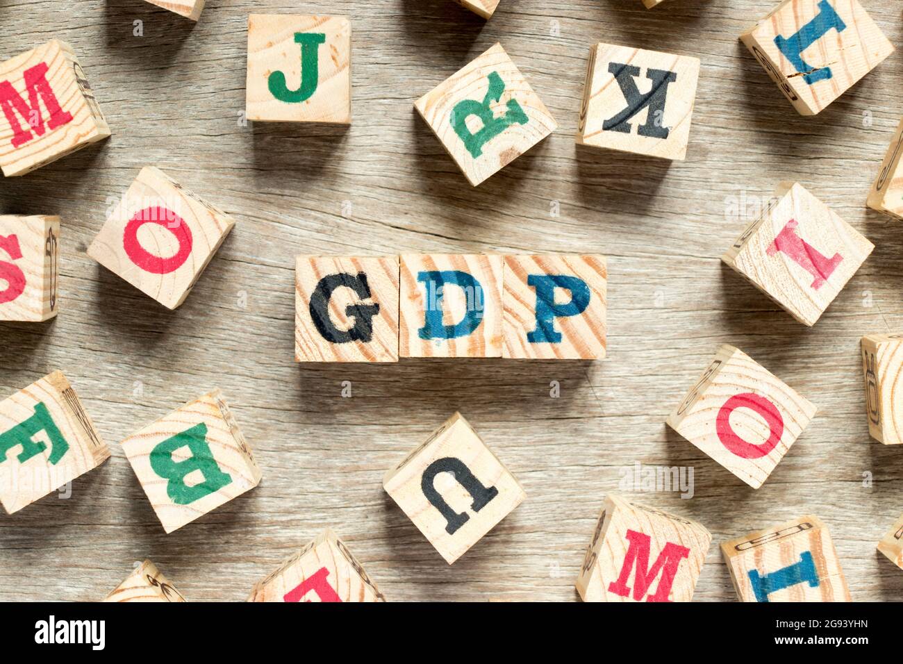 Letter block in word GDP with another on wood background Stock Photo ...