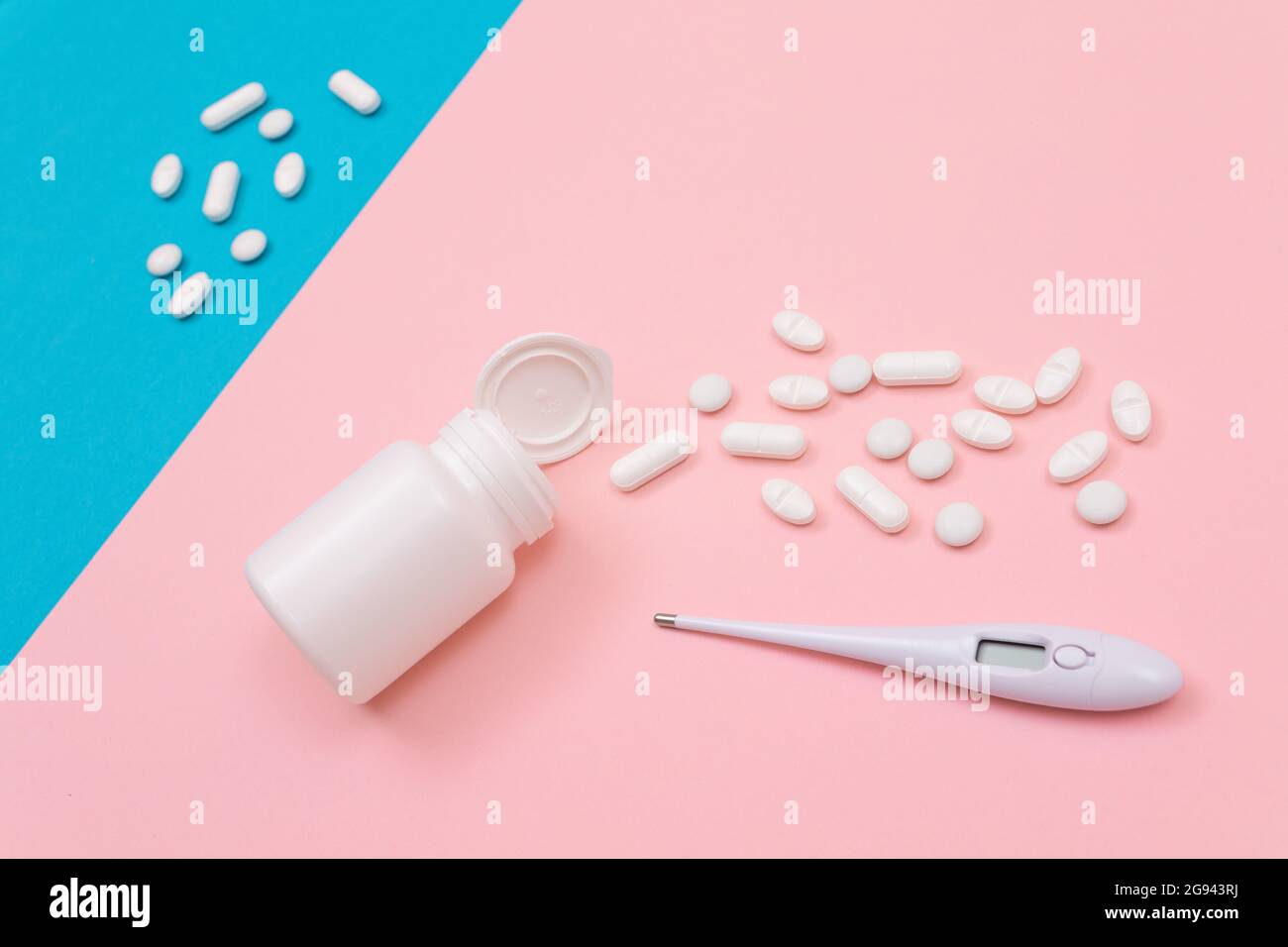 White Pills or Tablets Scattered from the Pill Container with ...