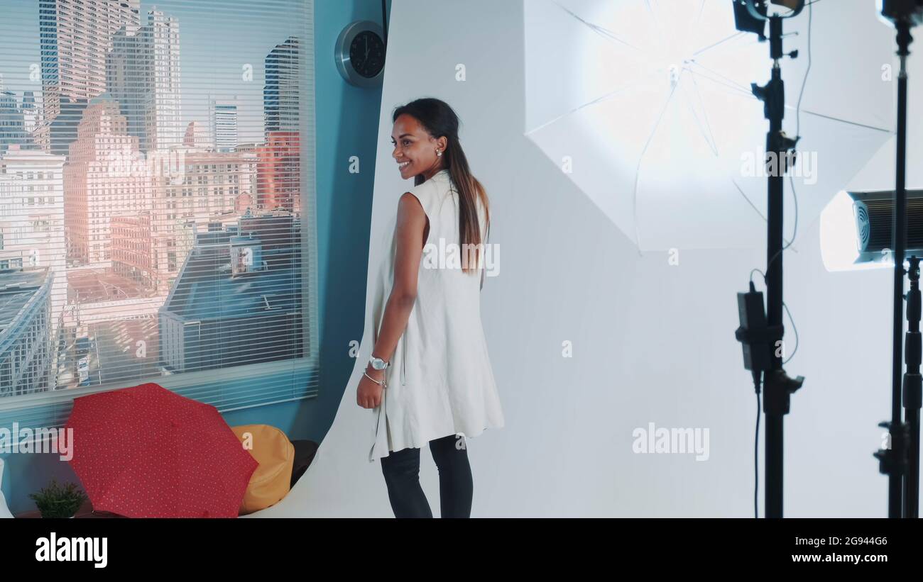 Photo shoot of stylish black model in modern professional studio photo ...