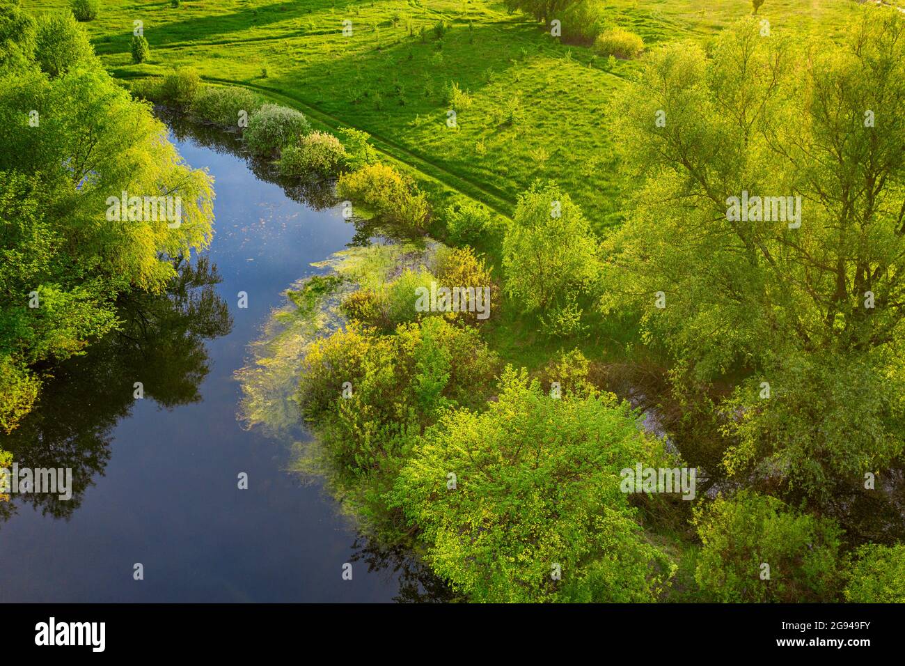 Spring landscape with river Stock Photo - Alamy