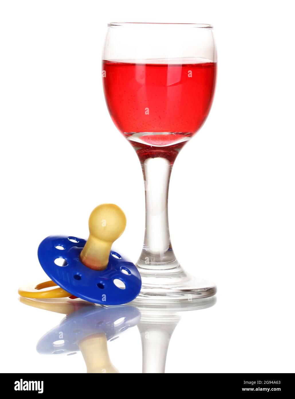 Baby dummy with alcoholic beverage isolated on white Stock Photo - Alamy