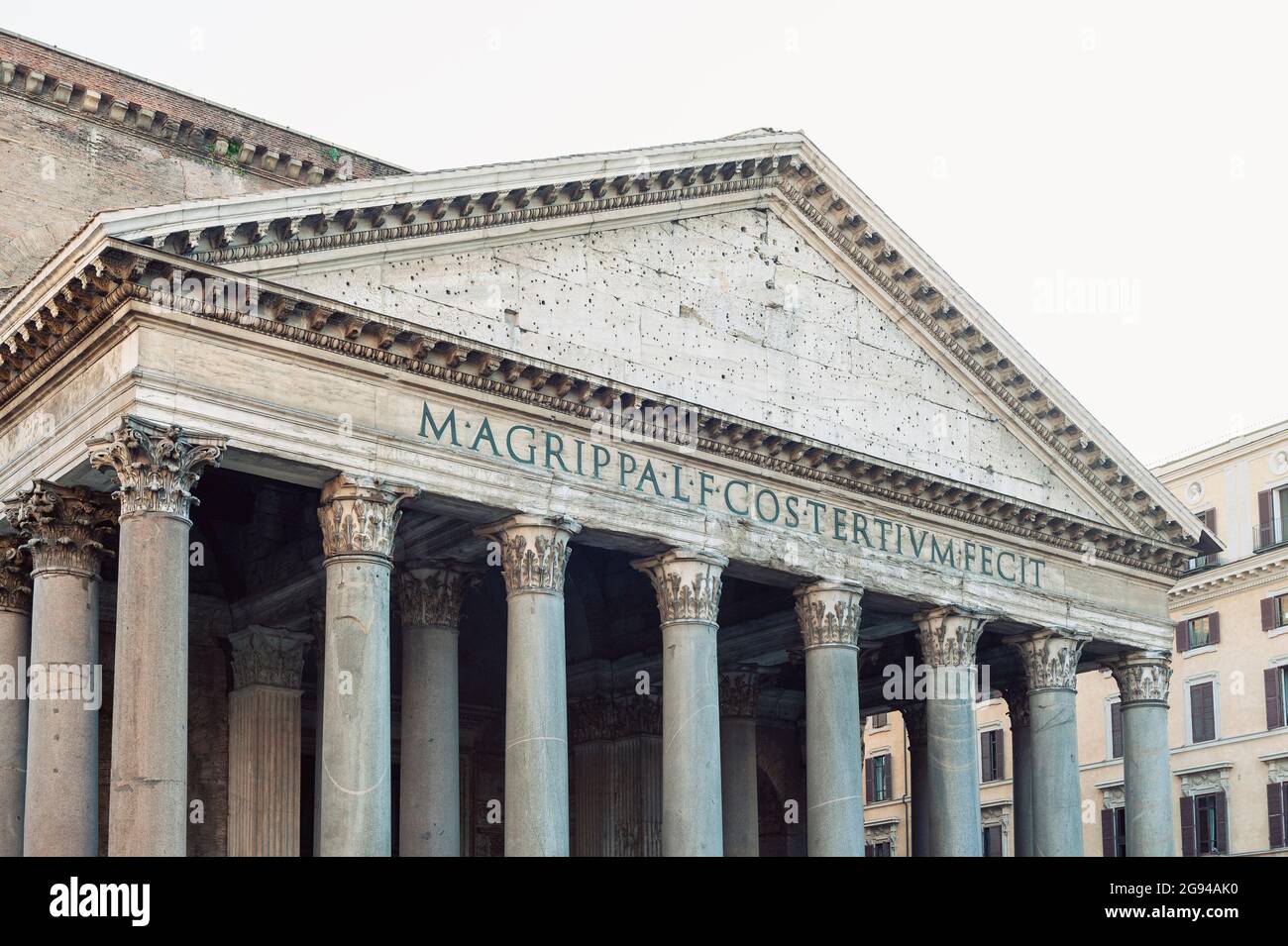 Details of a pediment and large granite Corinthian columns of the Pantheon, ancient Roman temple ...