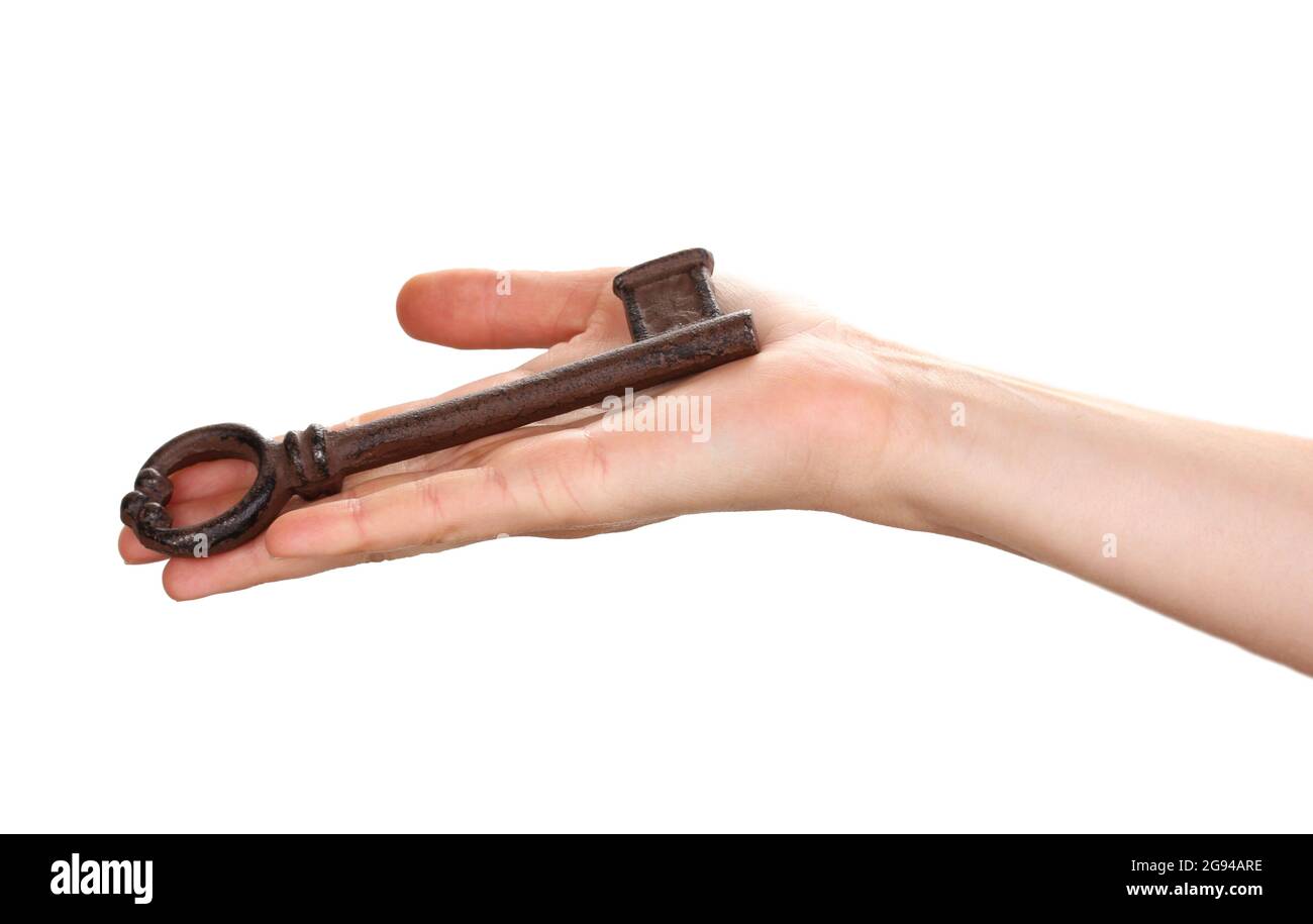 woman's hand holding an antique key on white background Stock Photo - Alamy