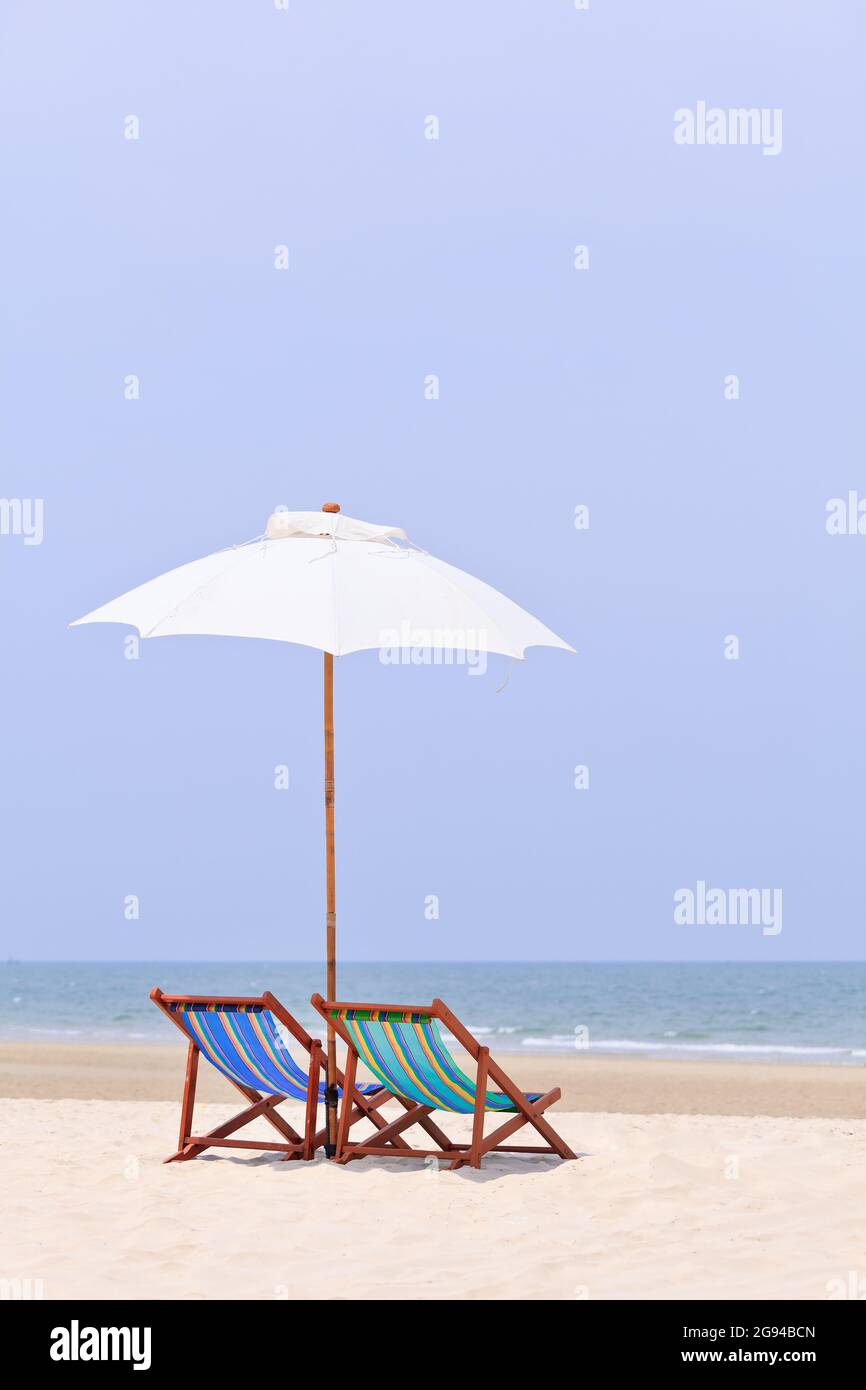 Colorful chairs on tropical beach Stock Photo - Alamy