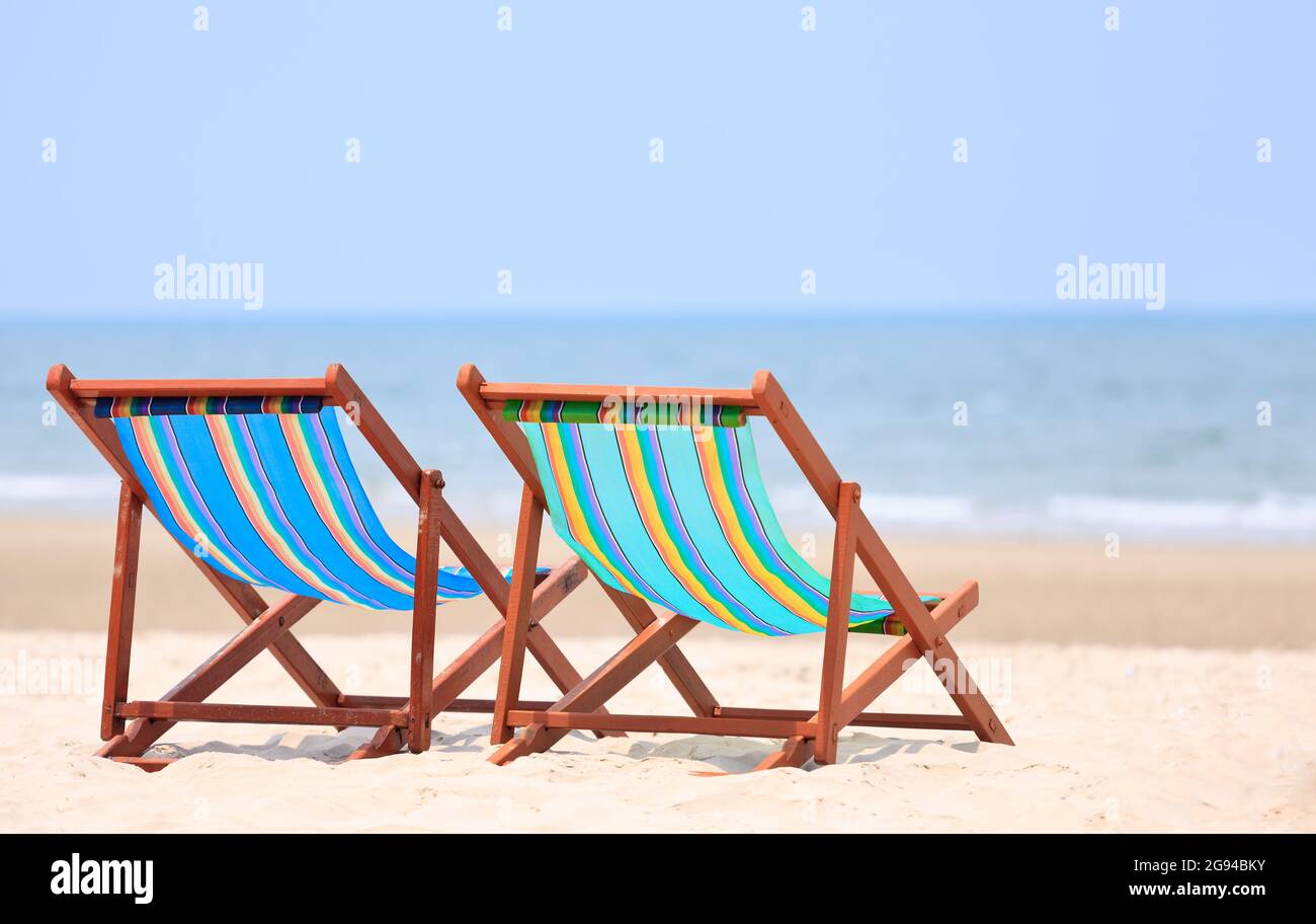 Colorful chairs on tropical beach Stock Photo - Alamy