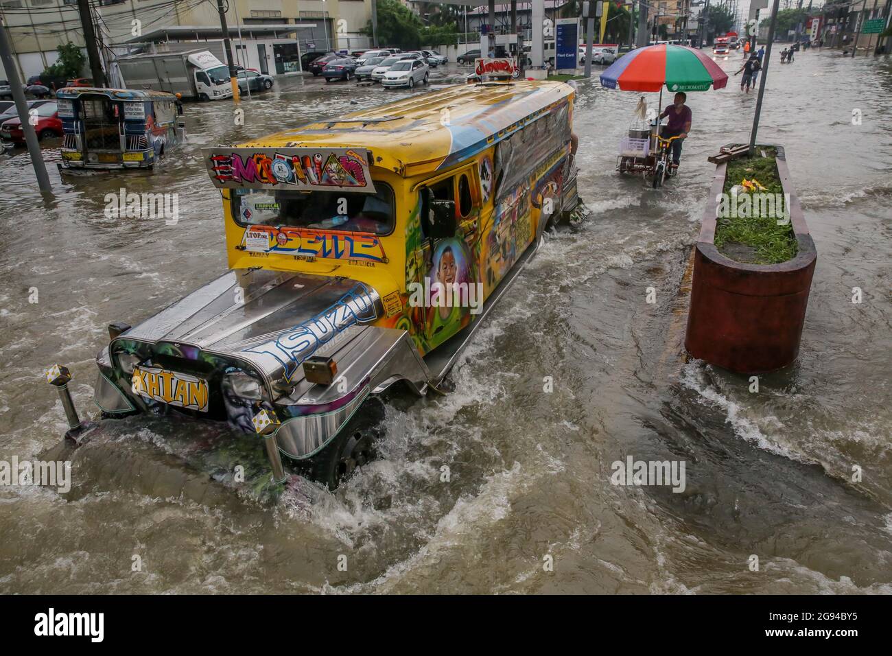 Rizal Province. 24th July, 2021. A passenger jeepney moves through the ...