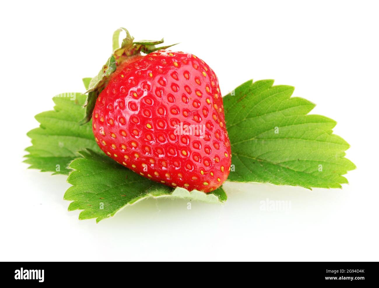 sweet ripe strawberry wit leaves isolated on white Stock Photo - Alamy