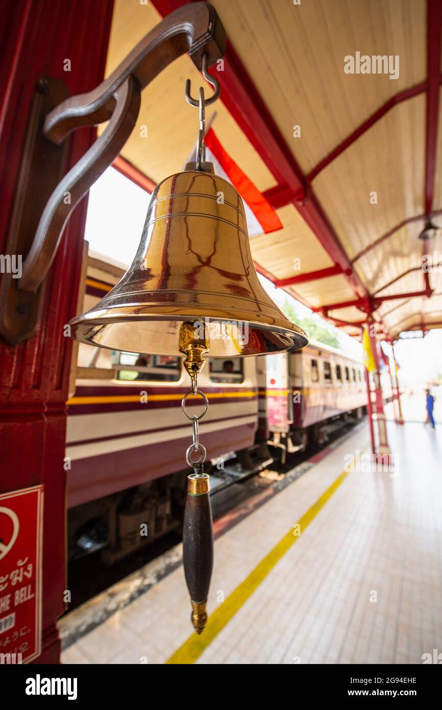 brass announcement bell at the train station in Hua Hin Stock Photo - Alamy