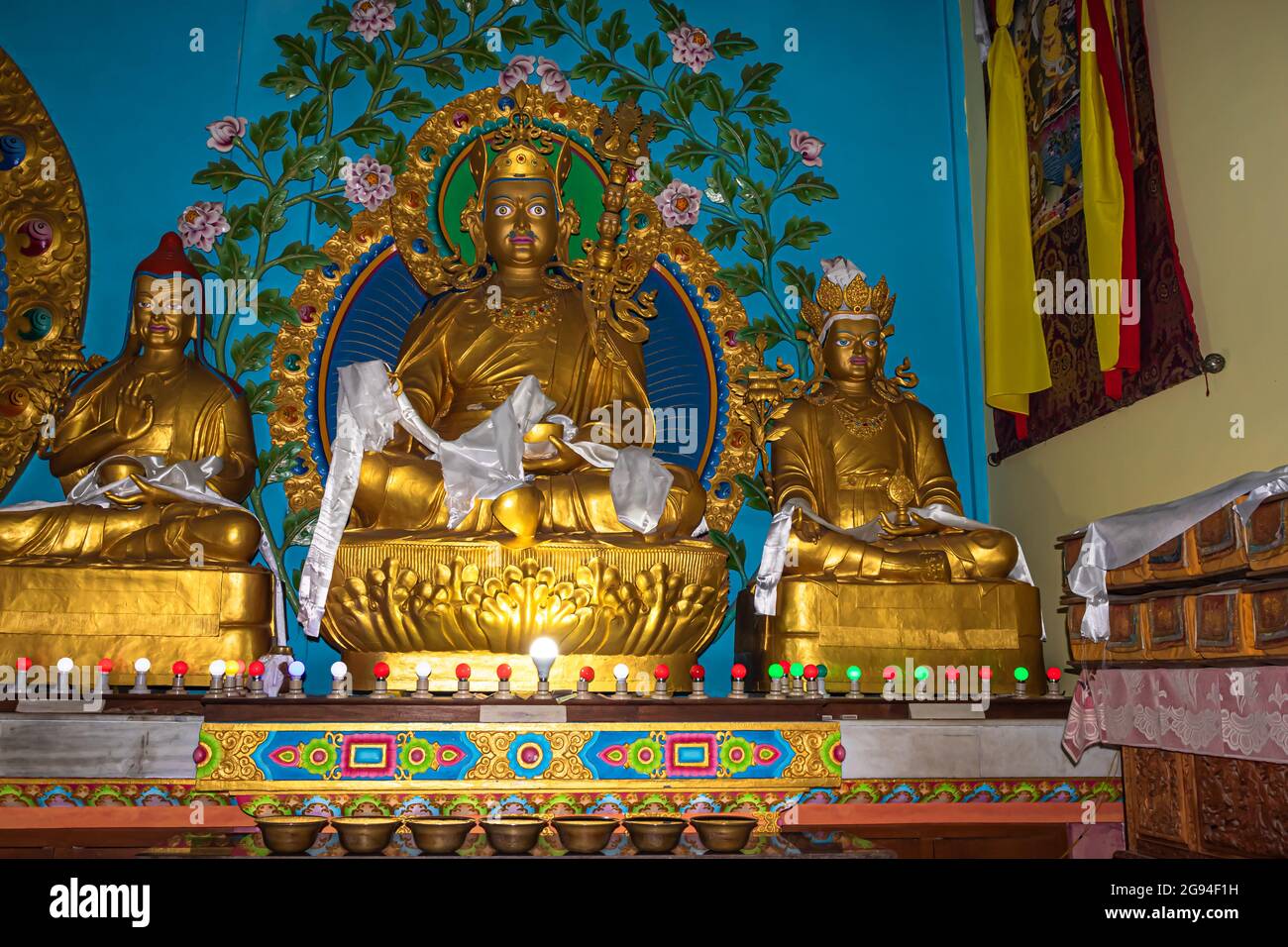 buddha disciple golden statue close up shot at monastery from different ...