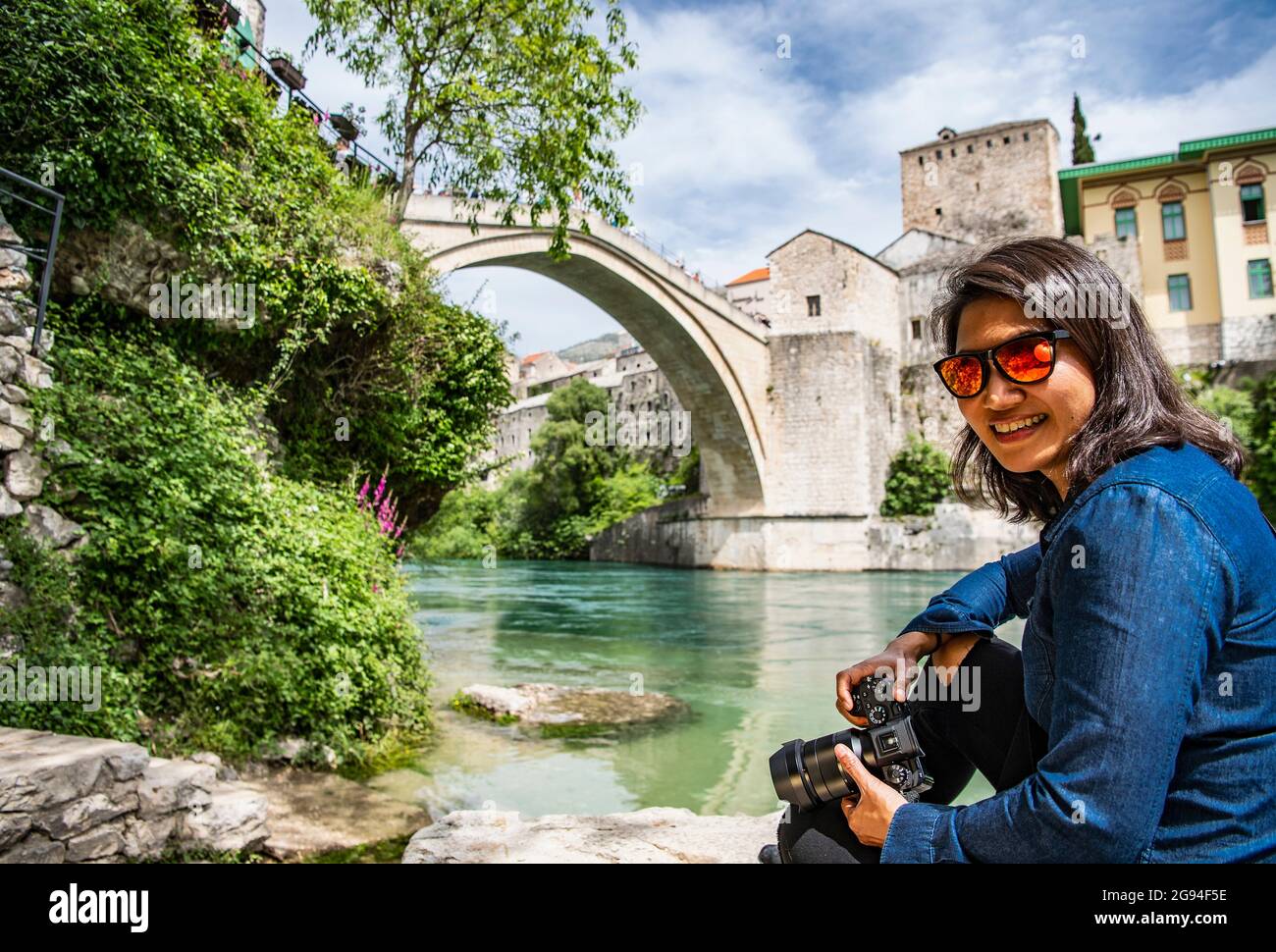 woman taking picture of the iconic bridge Stari Most in Mostar Stock ...