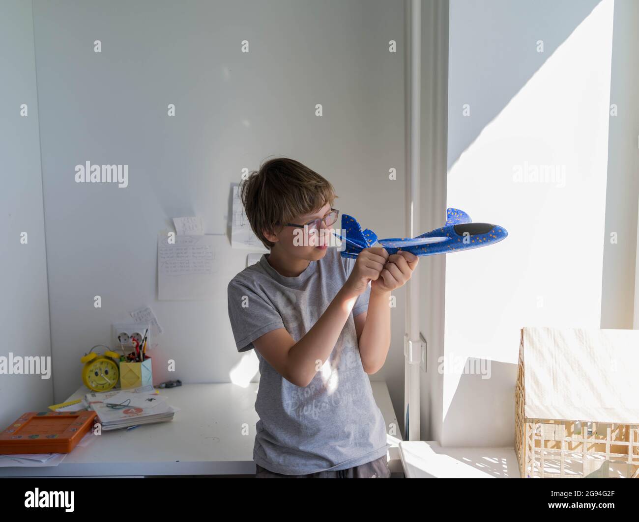 Boy with model airplane hi-res stock photography and images - Alamy