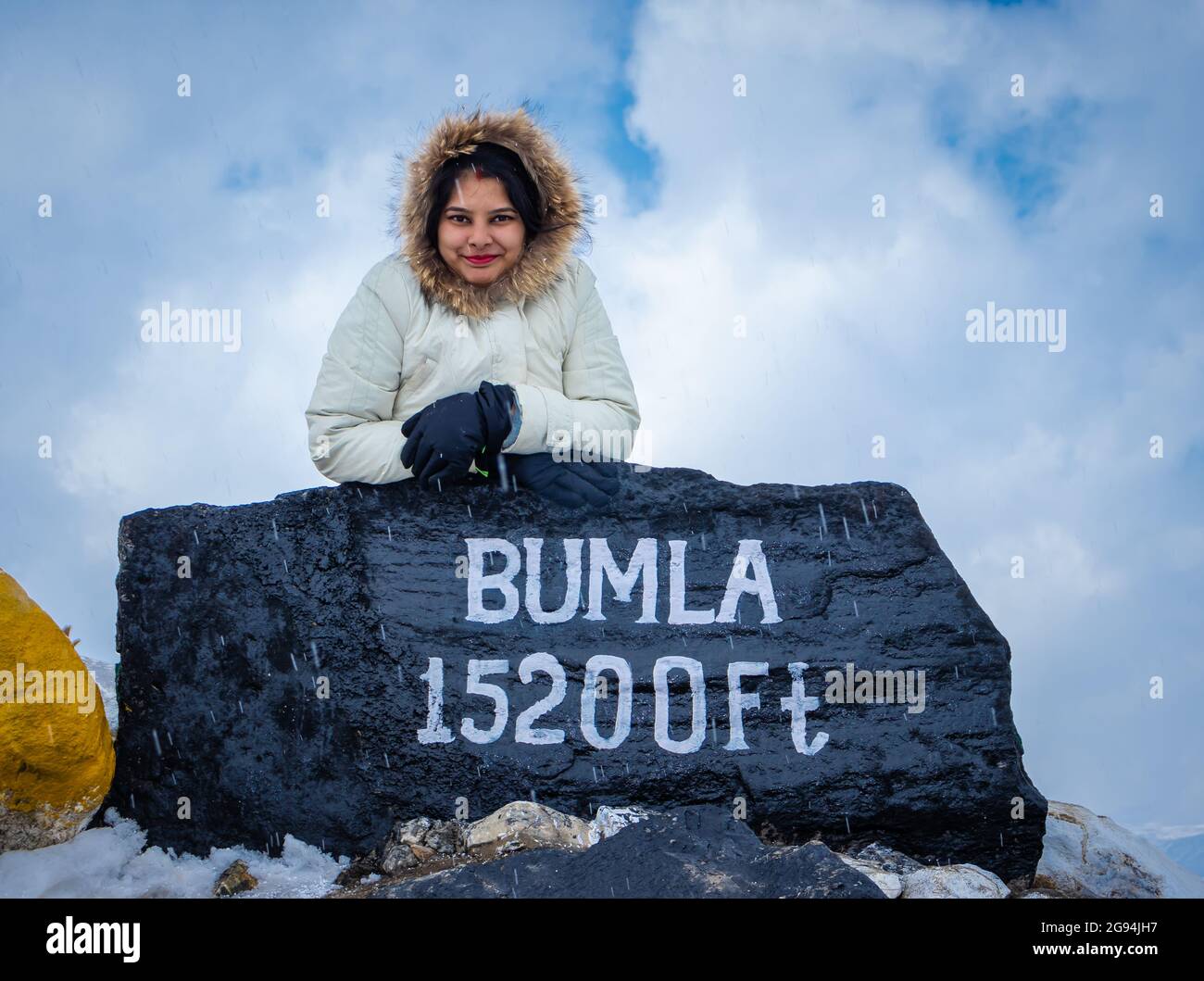 young girl isolated at bumla pass india china border milestone board ...