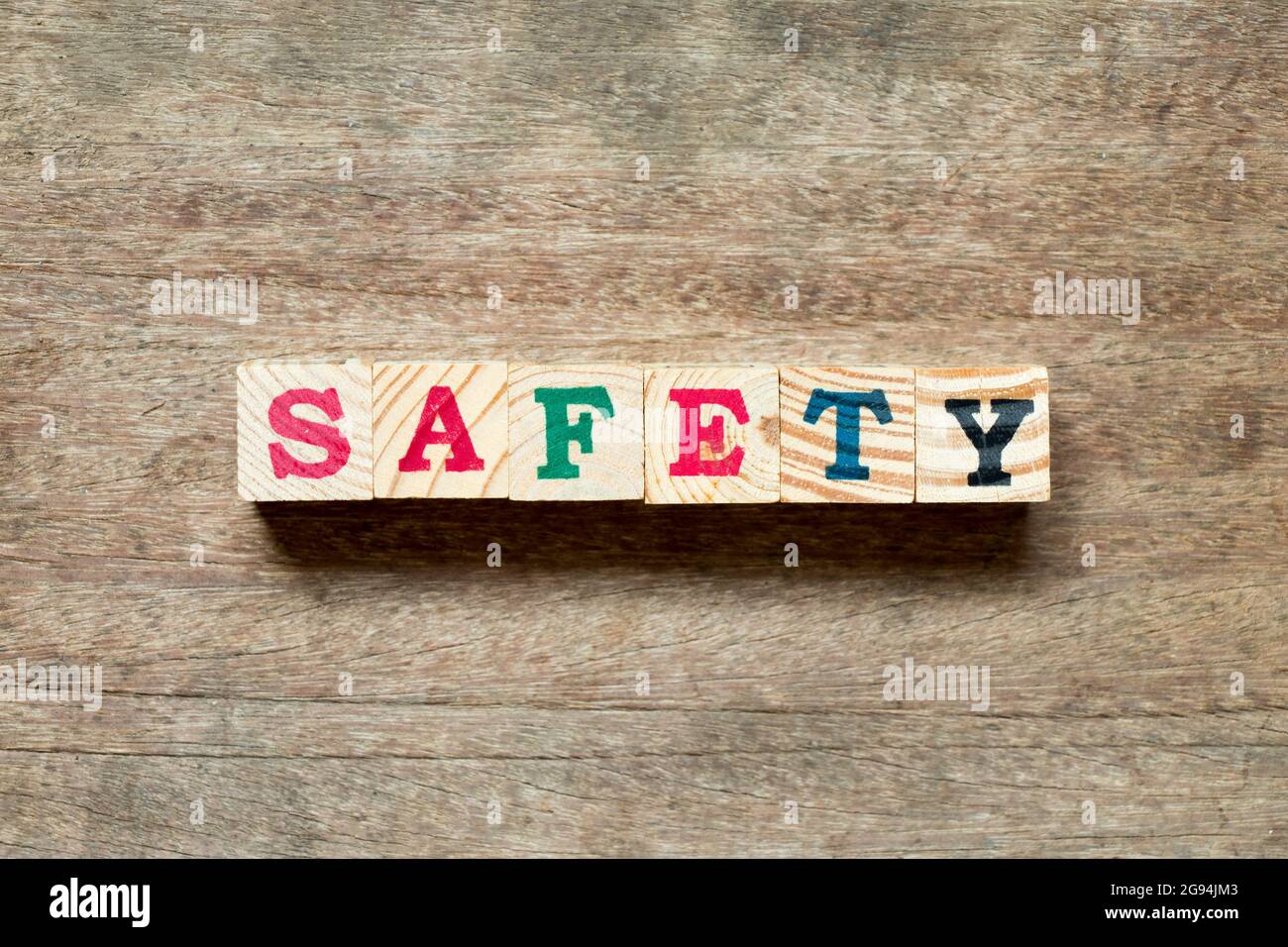 Block in word safety on wood background Stock Photo - Alamy