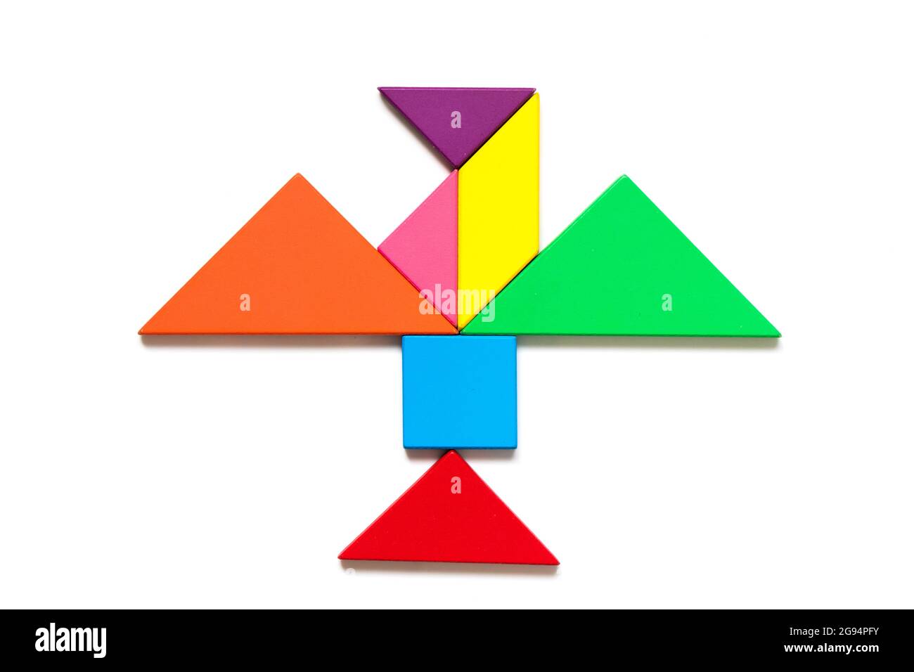 Color wood tangram puzzle in flying bird shape on white background ...