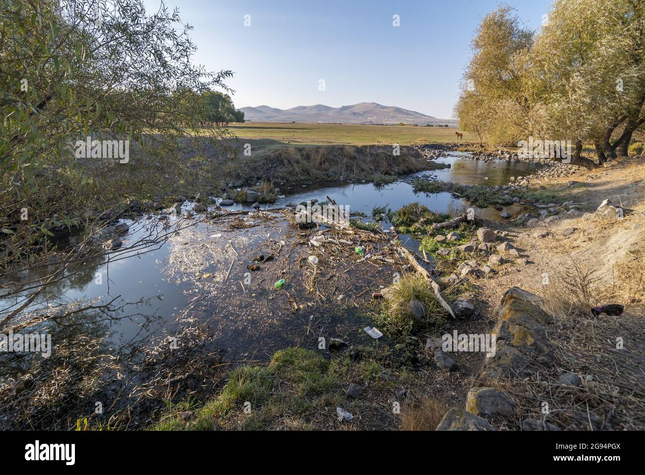 Lot of plastic waste in the river; environmental problem Stock Photo ...