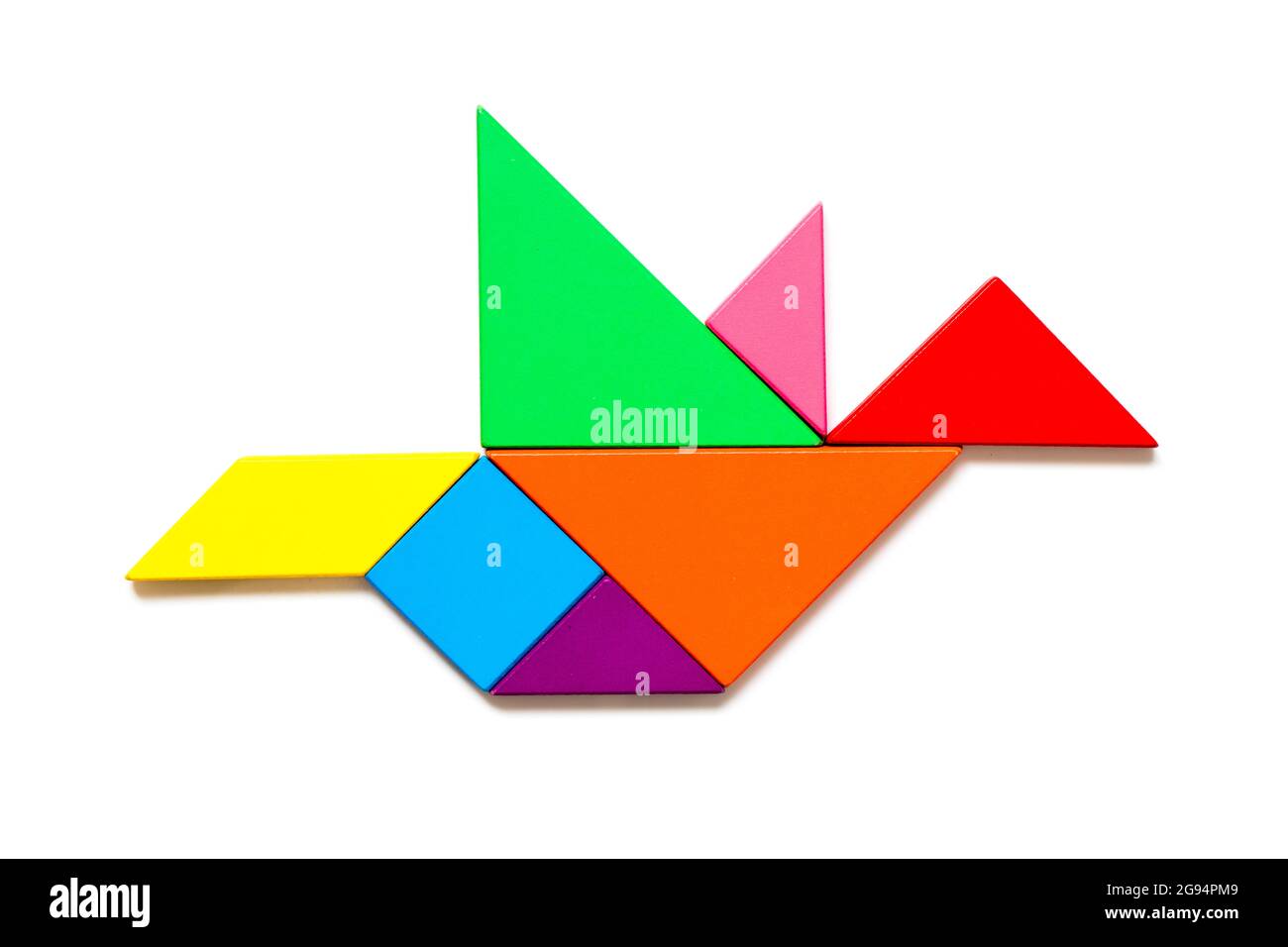 Color wood tangram puzzle in flying bird shape on white background ...