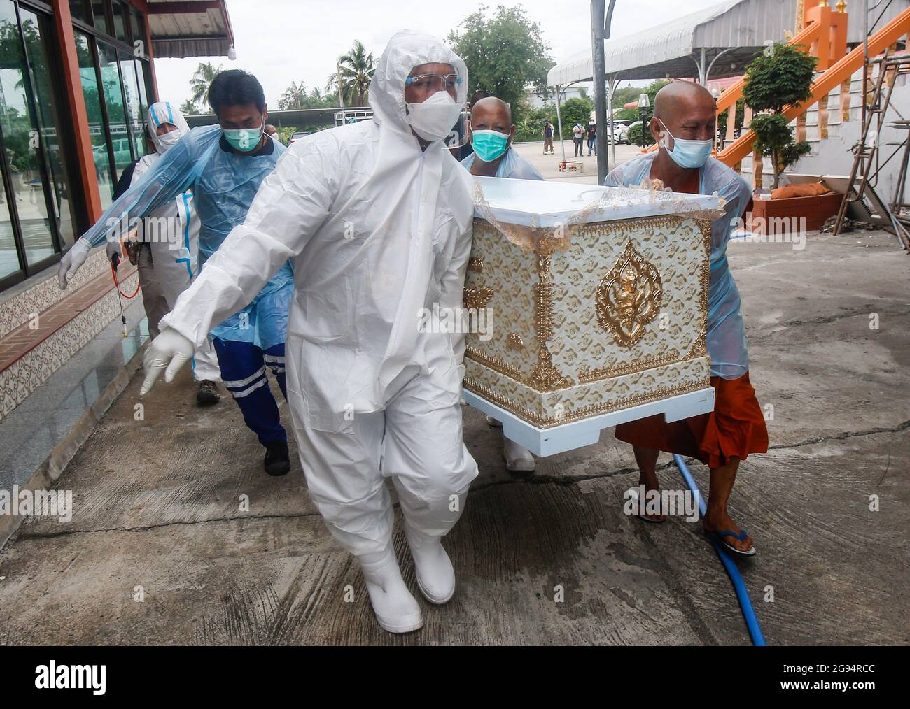 (EDITORS NOTE: Image depicts death) Temple workers wearing personal ...